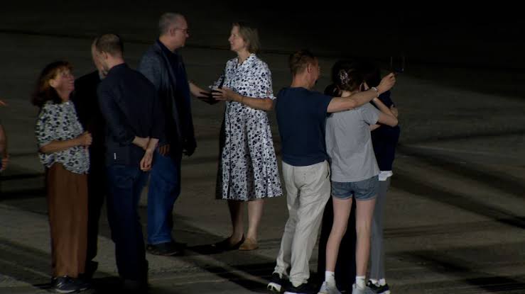 Tears, hugs and a salute as three freed Americans back on US soil after ...